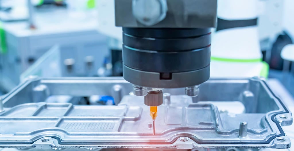 Hot Melt Adhesive Dispensing Machine | Omniseal Solutions